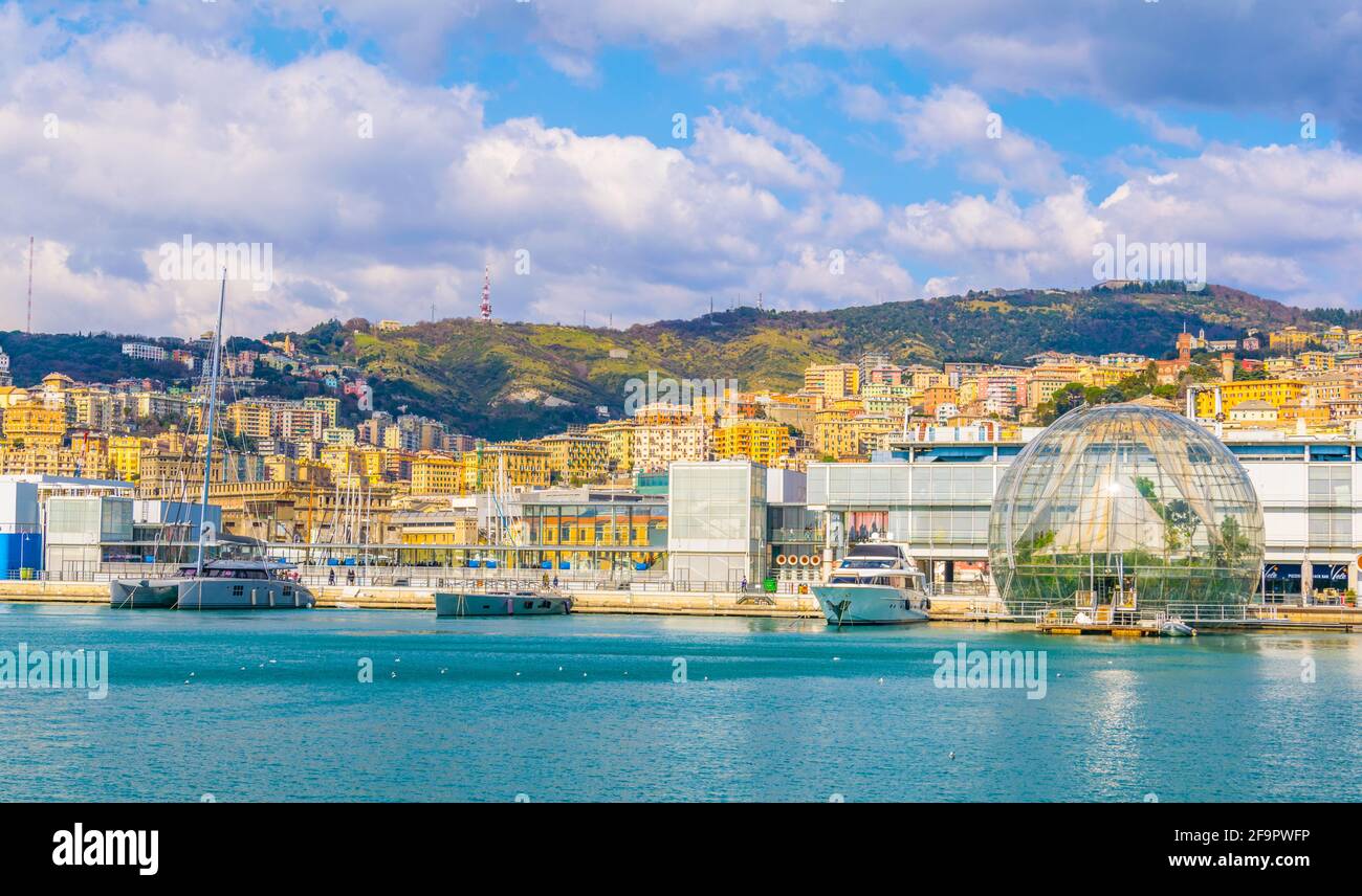 View of the port of genoa dominated by an aquarium and the biosphere ...