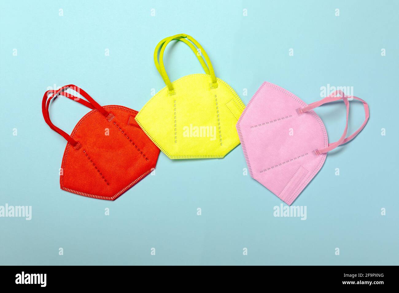 Three face mask color of Covid regions Stock Photo - Alamy