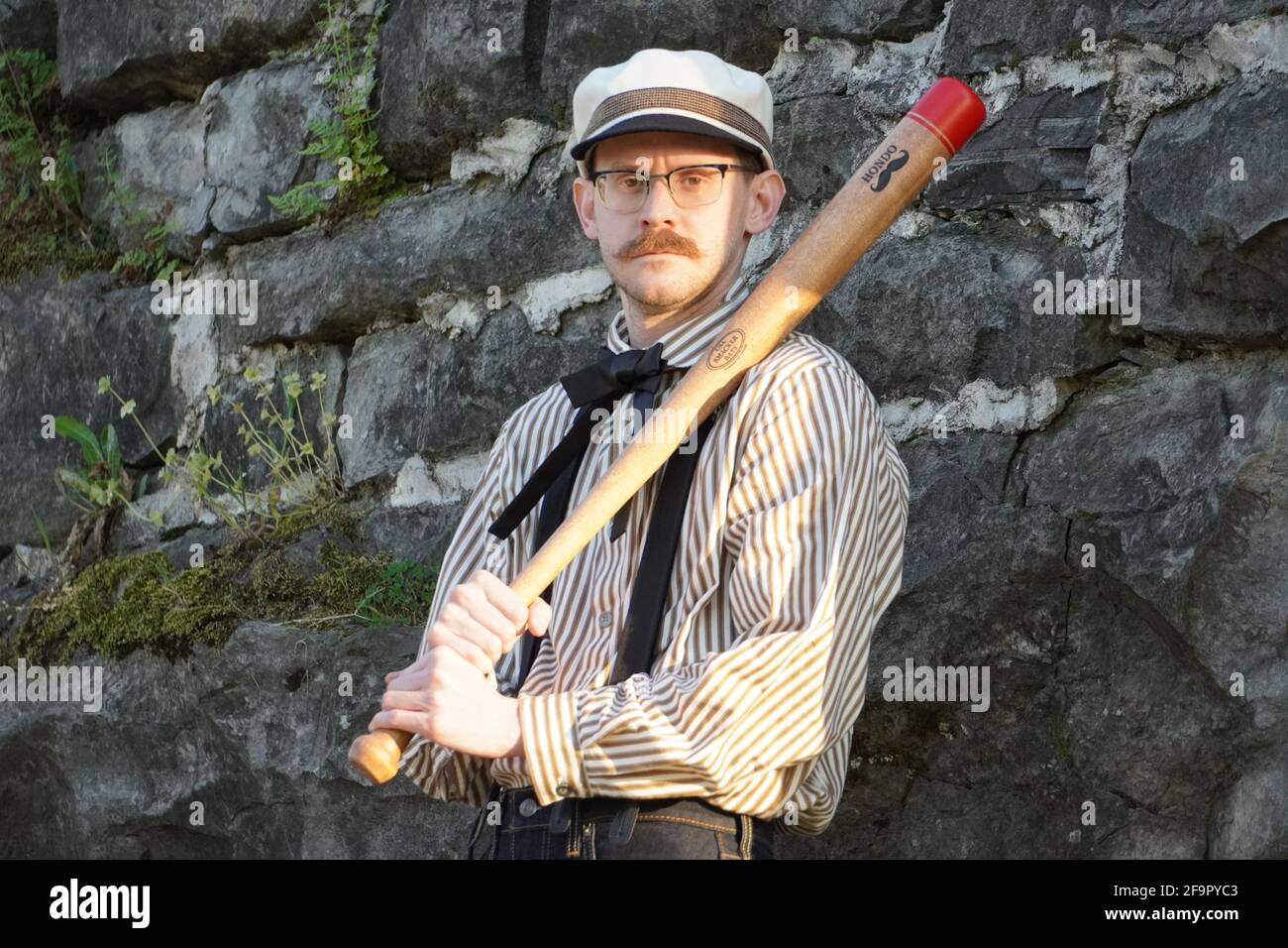 Vintage baseball player poses for picture Stock Photo - Alamy