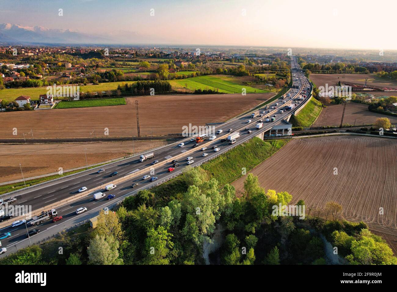 Motorway with flowing traffic seen from above. Turin, Italy - April ...