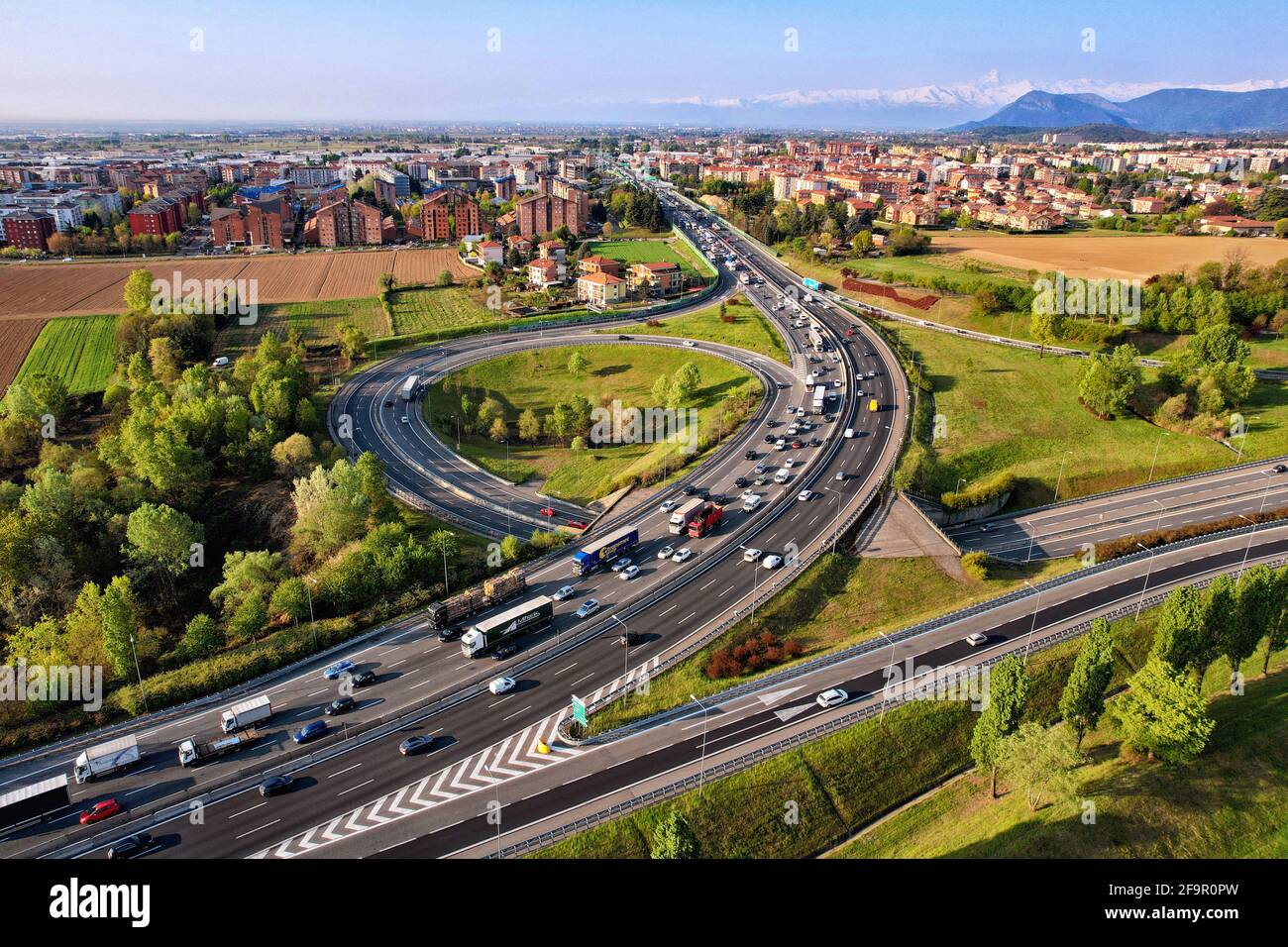 Motorway with flowing traffic seen from above. Turin, Italy - April ...