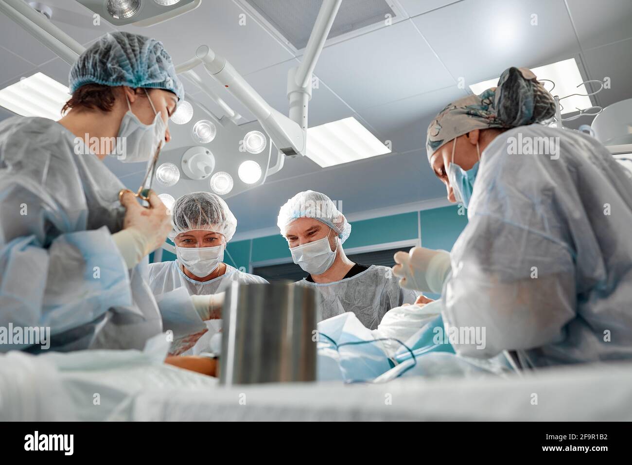 Team surgeon at work in operating room Stock Photo - Alamy