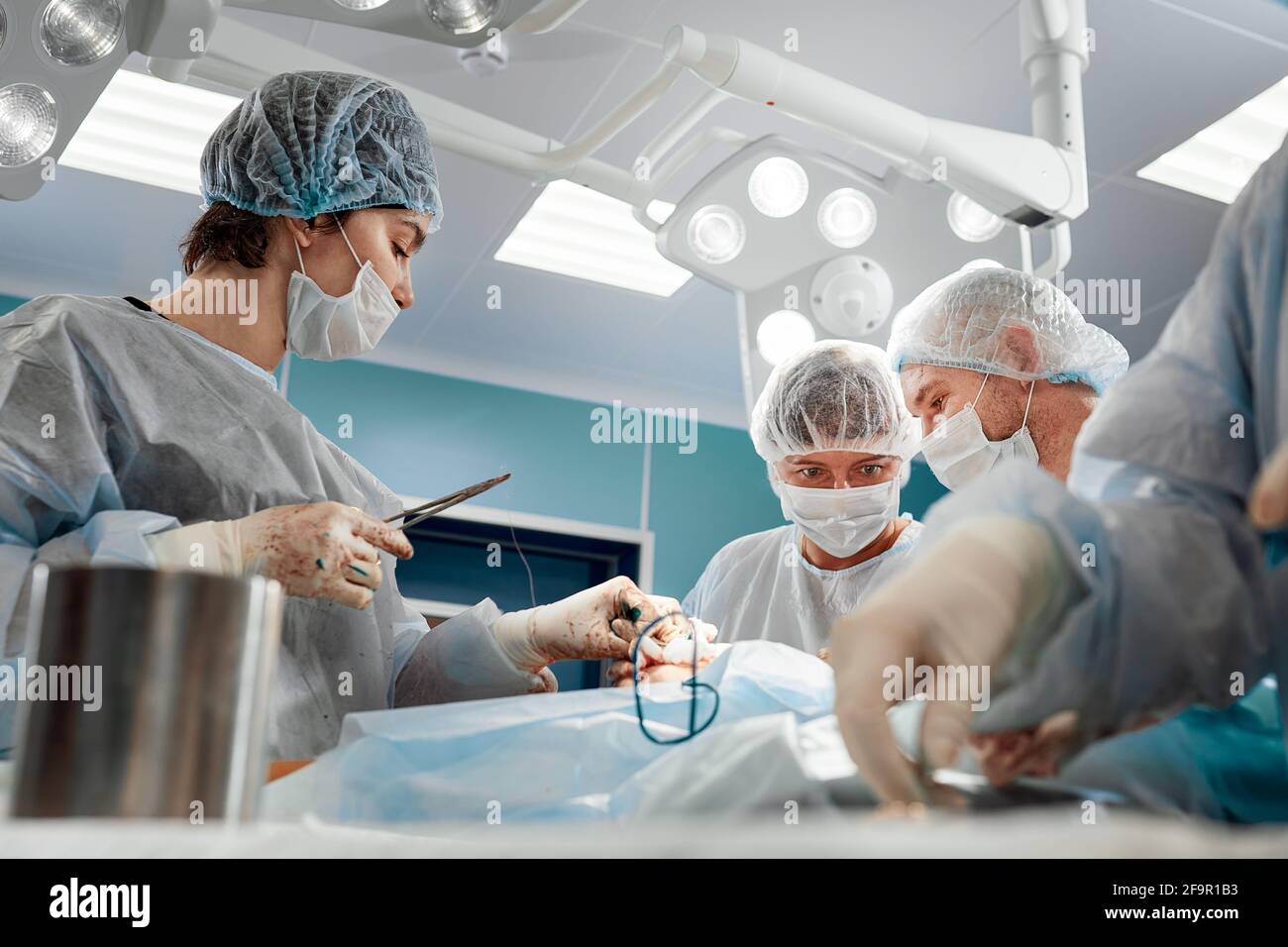 Team surgeon at work in operating room Stock Photo - Alamy