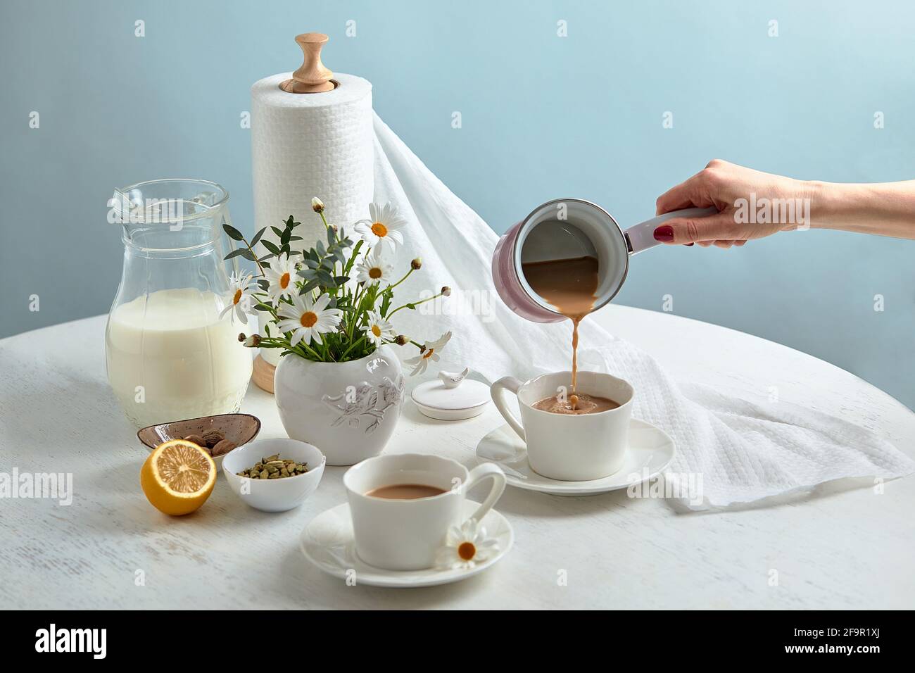 Breakfast is served on a table with light blue background. Breakfast ...