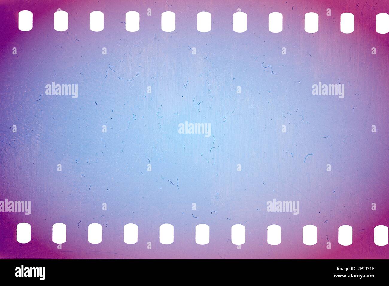 Dusty and grungy 35mm film texture or surface. Perforated camera film ...