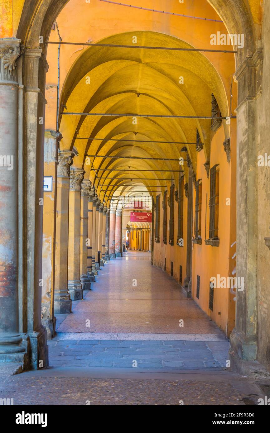 View of a covered arcade in the historical center of the italian town ...