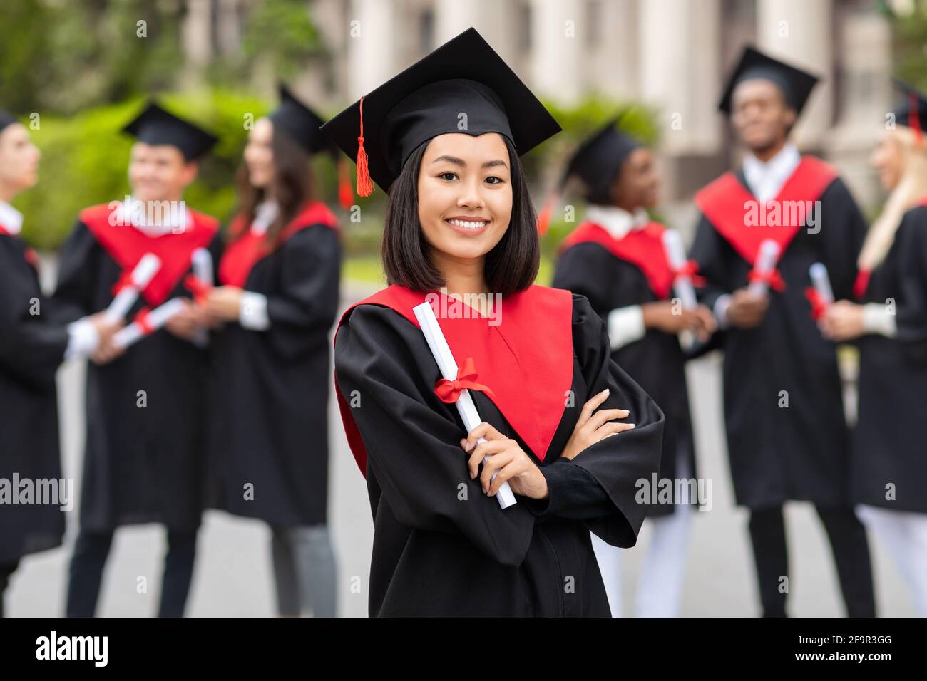 Happy asian lady student having graduation party Stock Photo - Alamy
