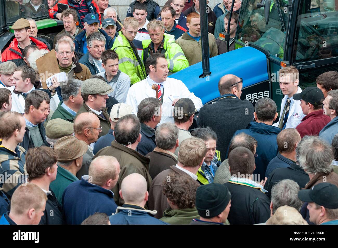 Crowd at a farm sale in Cheshire UK, where the owners were retiring and ...
