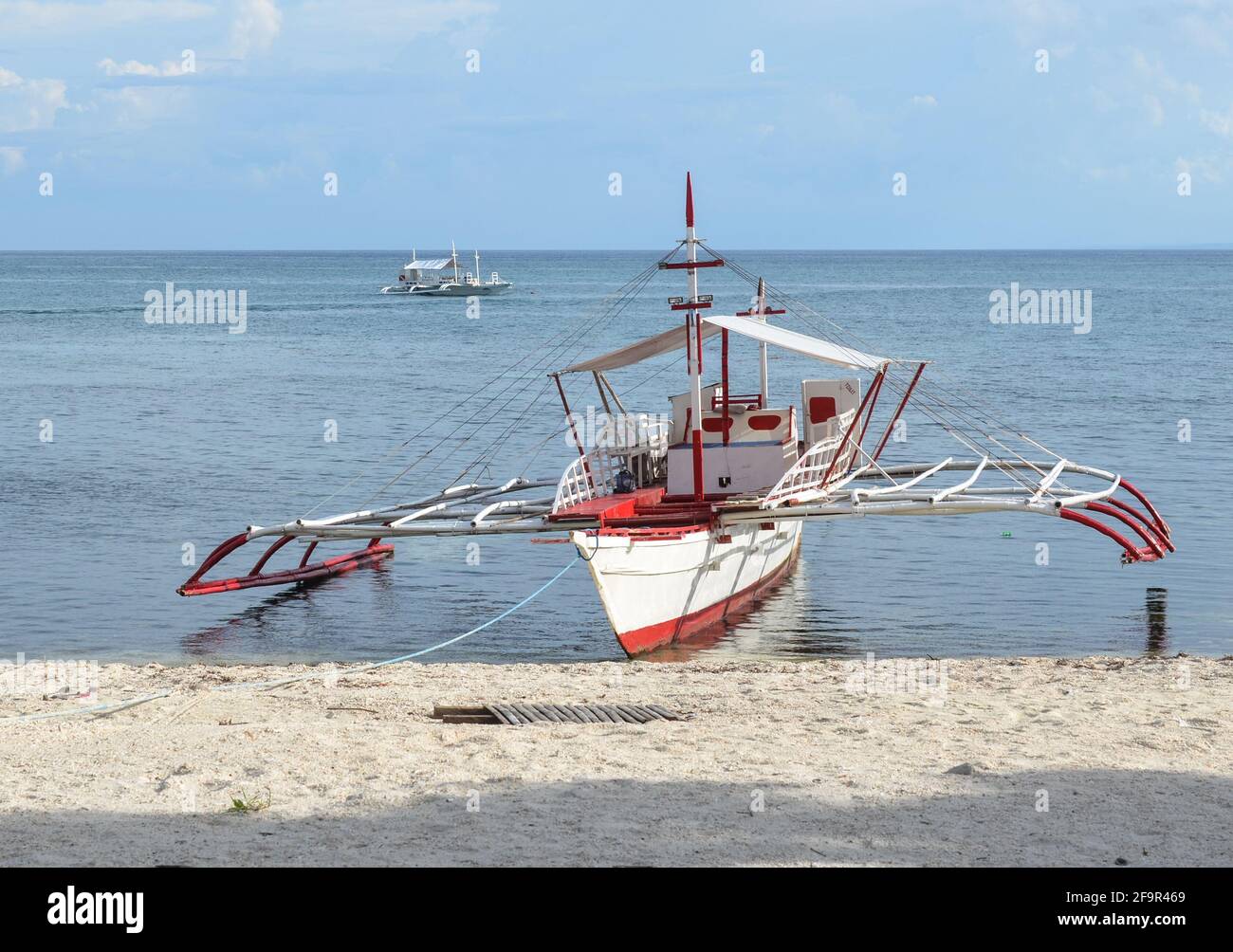 The typical boat of Malapascua Island Stock Photo - Alamy