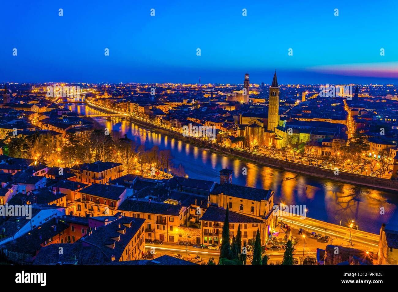 aerial view of the italian city verona during sunset including church ...