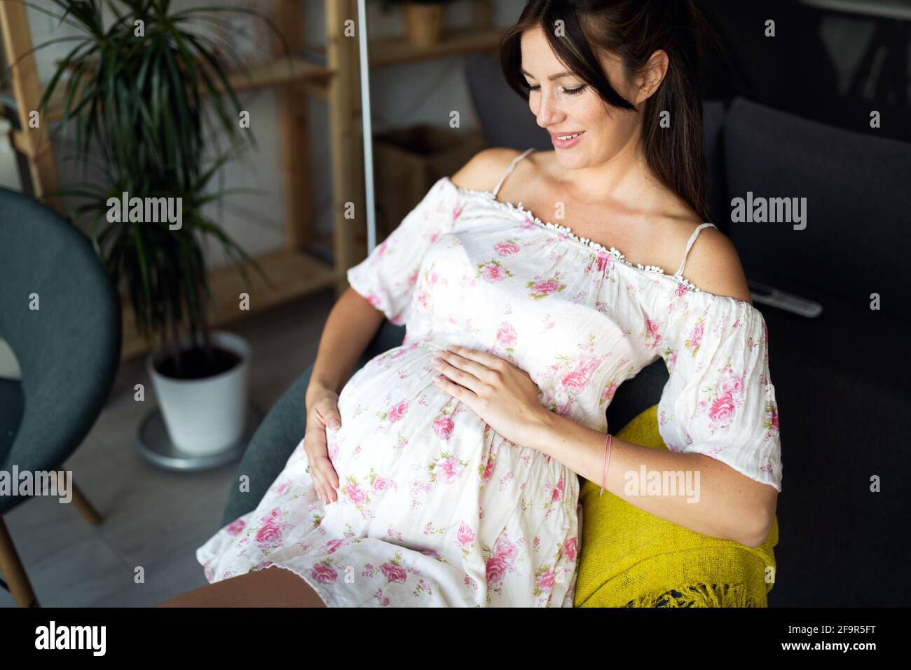 Beautiful pregnant woman expecting baby. Maternity concept Stock Photo ...