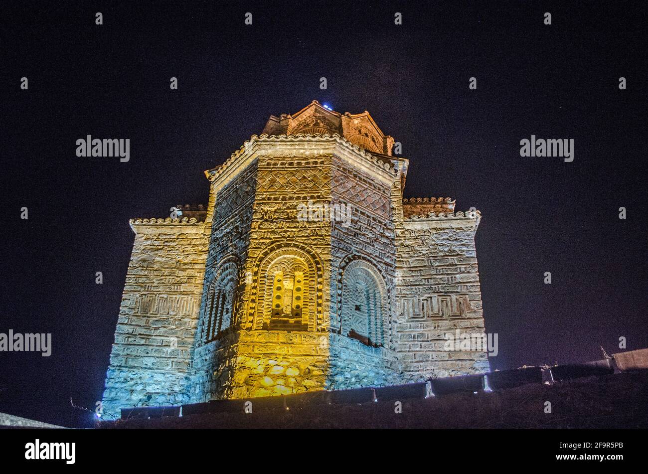night view over illuminated church of saint john at kameo in macedonian ...