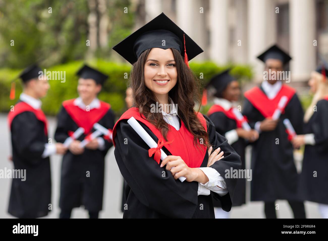 Positive pretty lady student having graduation party Stock Photo - Alamy