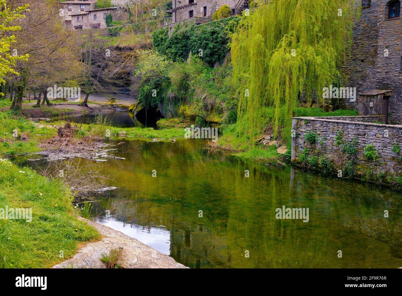 Precious corners can be seen bordering the Rupit stream as it passes ...
