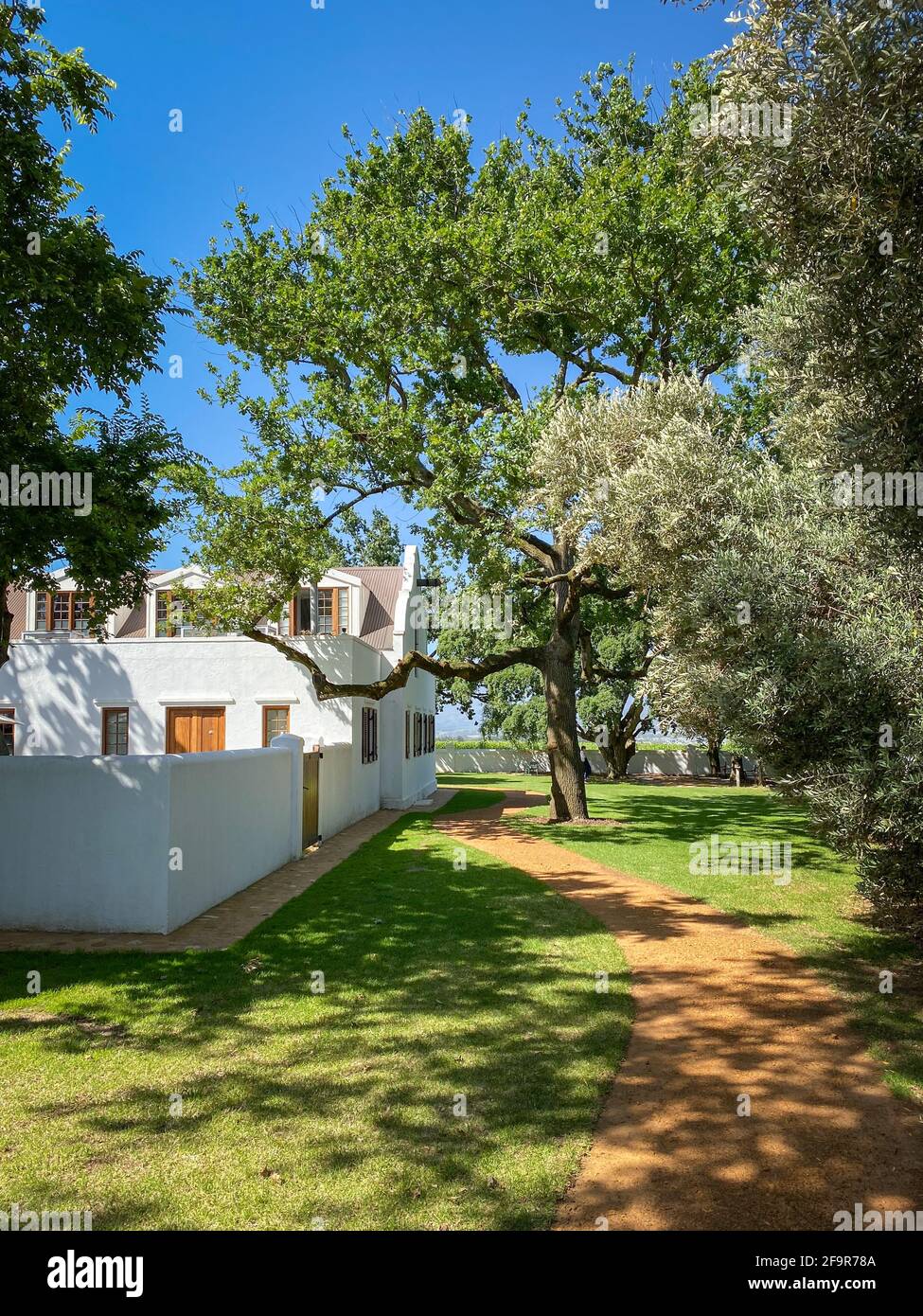 Historical building in cape dutch architecture style at Babylonstoren ...