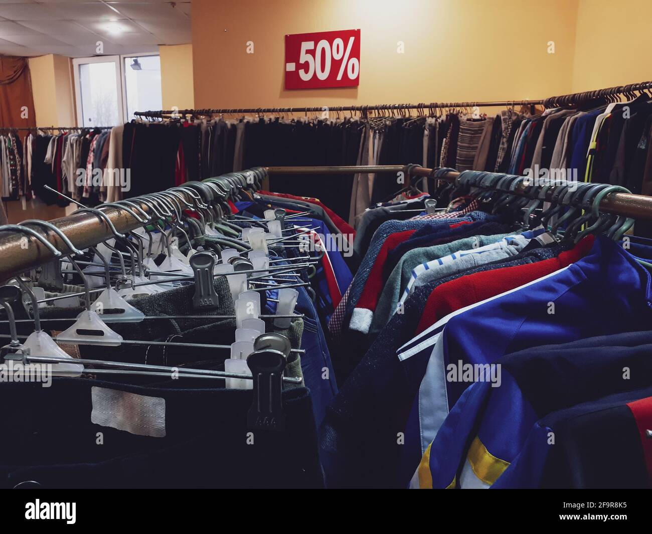 Seasonal sale in a clothing store Stock Photo - Alamy