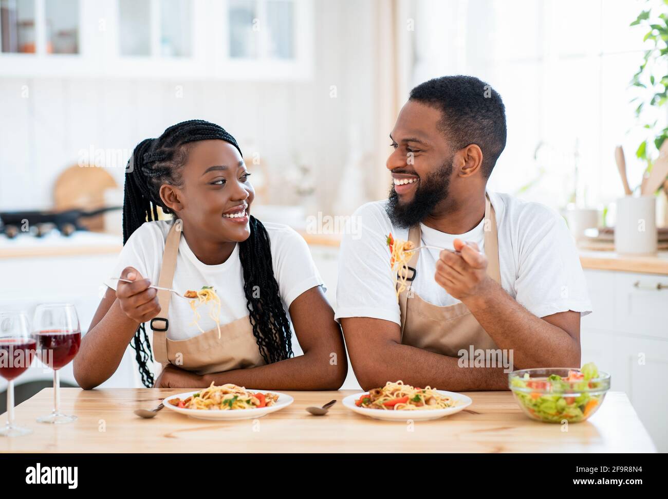 Happy man eating spaghetti hi-res stock photography and images - Alamy