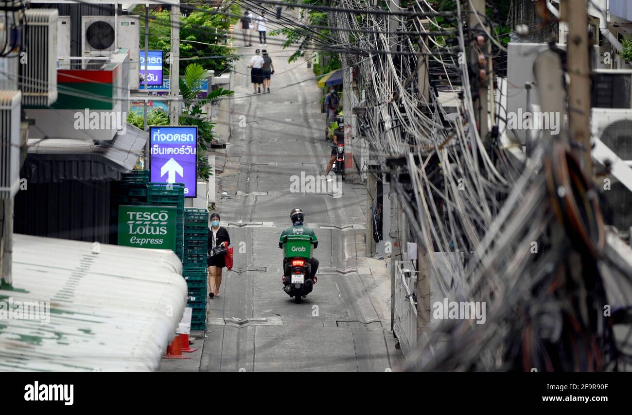 A Grab motorcycle rider seen making delivery.During the Covid-19 ...
