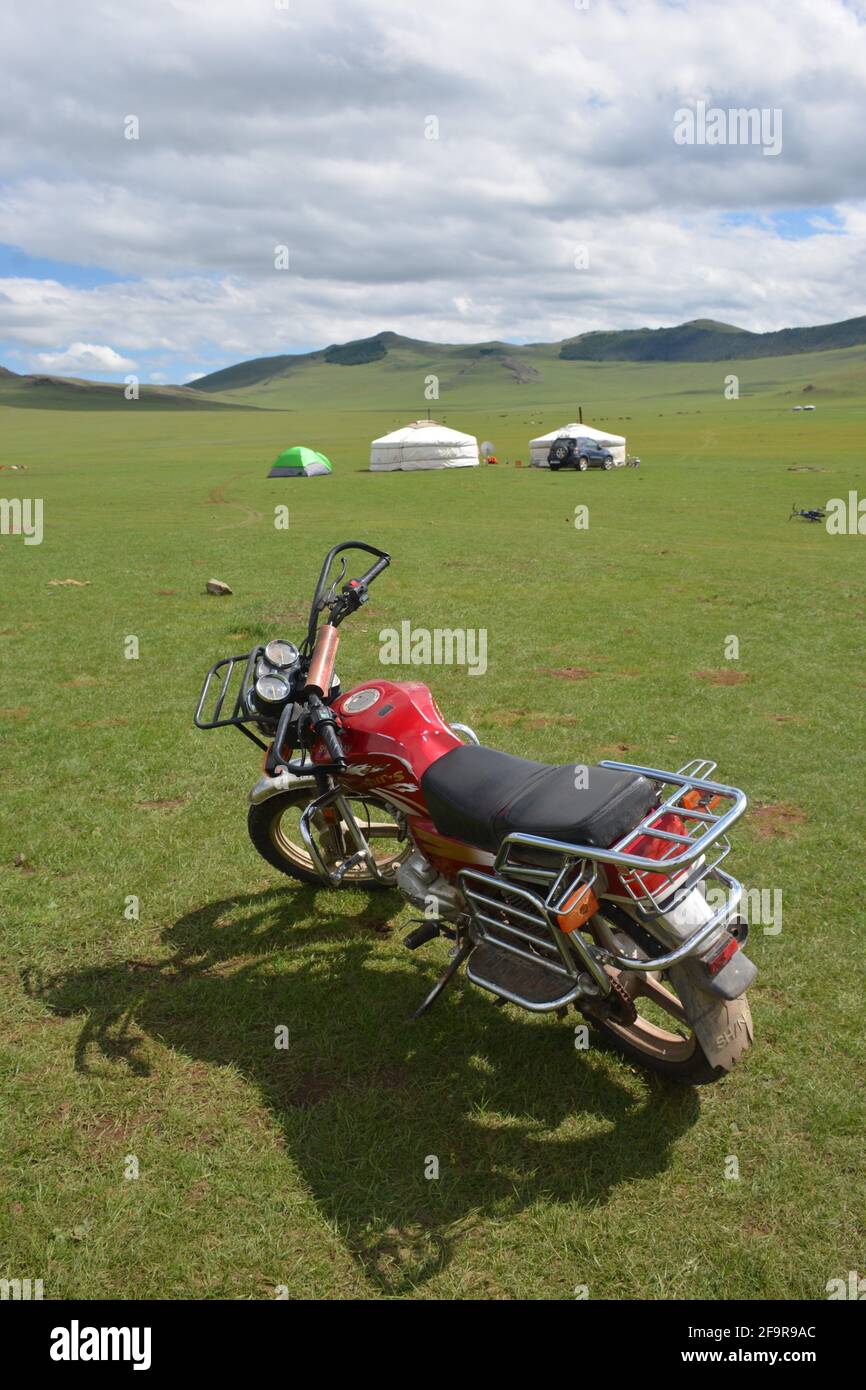 A motorbike used for herding on the steppe of the Orkhon Valley area of ...