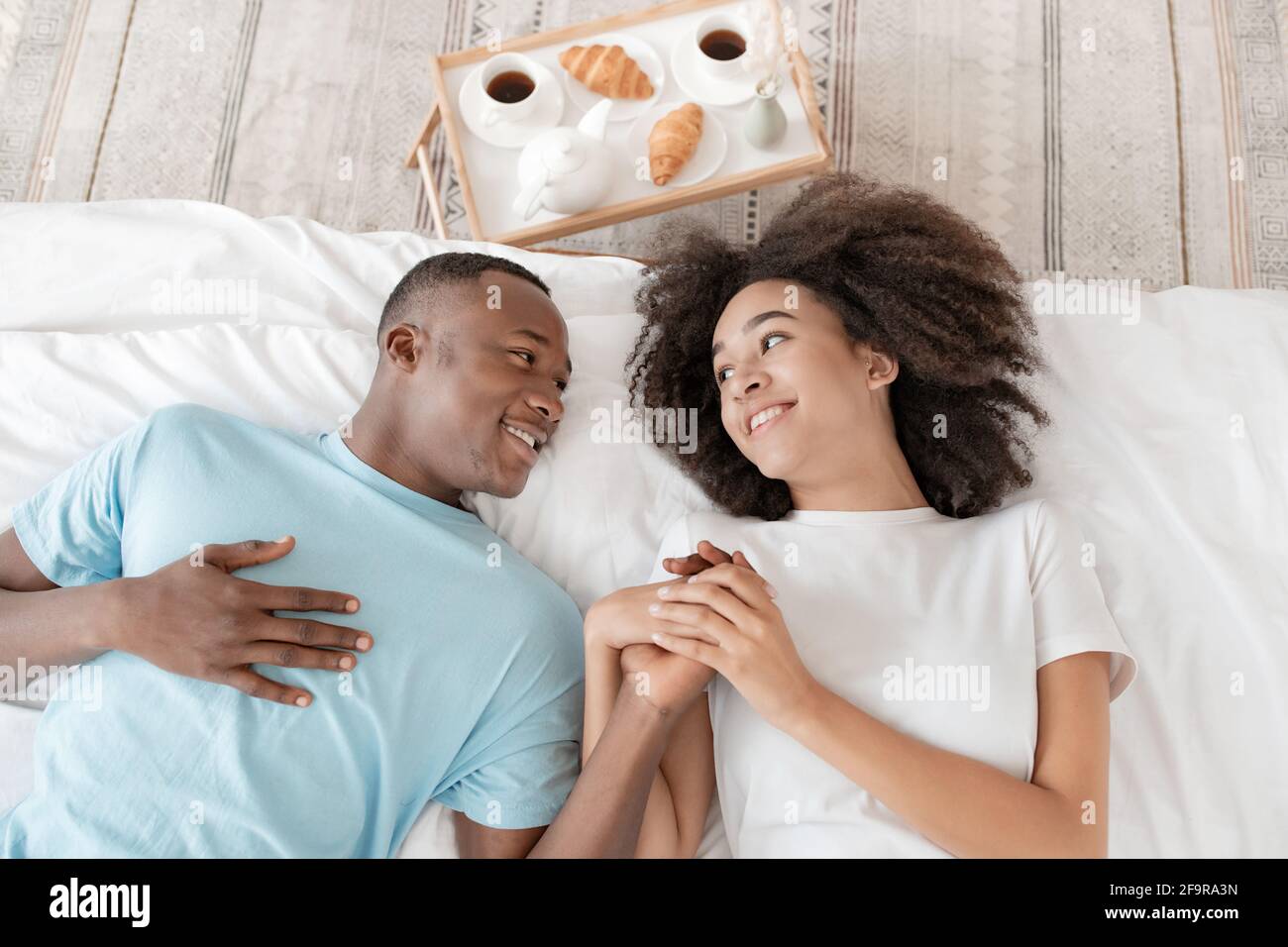 Happy morning, romantic breakfast and tenderness couple at home Stock ...