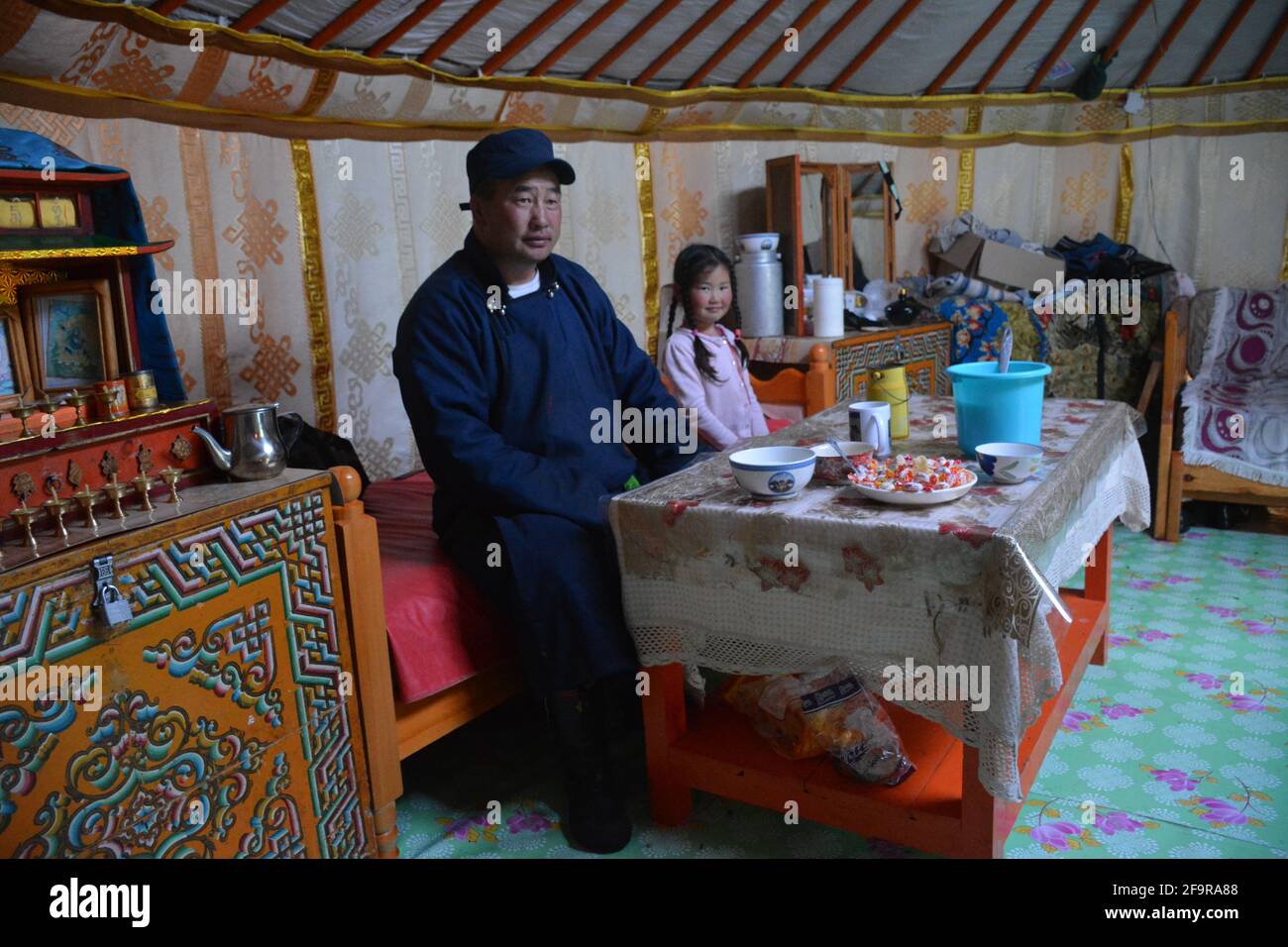 A traditional nomadic family in their ger camp home in the Unesco ...