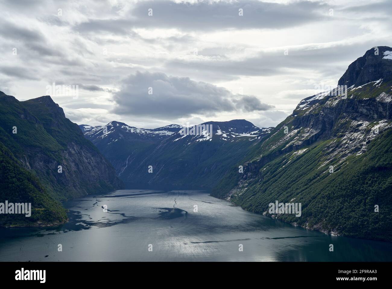 Beautiful shot of Besseggen Ridge in Norway with beautiful green hills ...