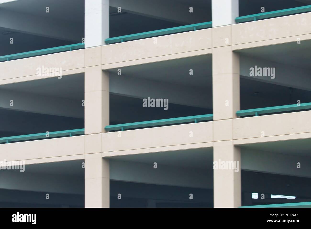 open air windows of multi floor parking garage Stock Photo - Alamy