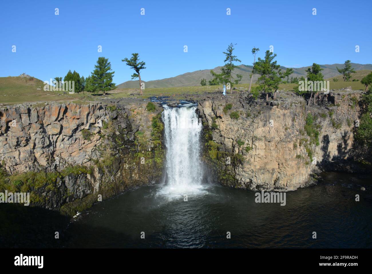The Red Waterfall, also known as Ulaan Tsutgalan on the Orkhon River in ...