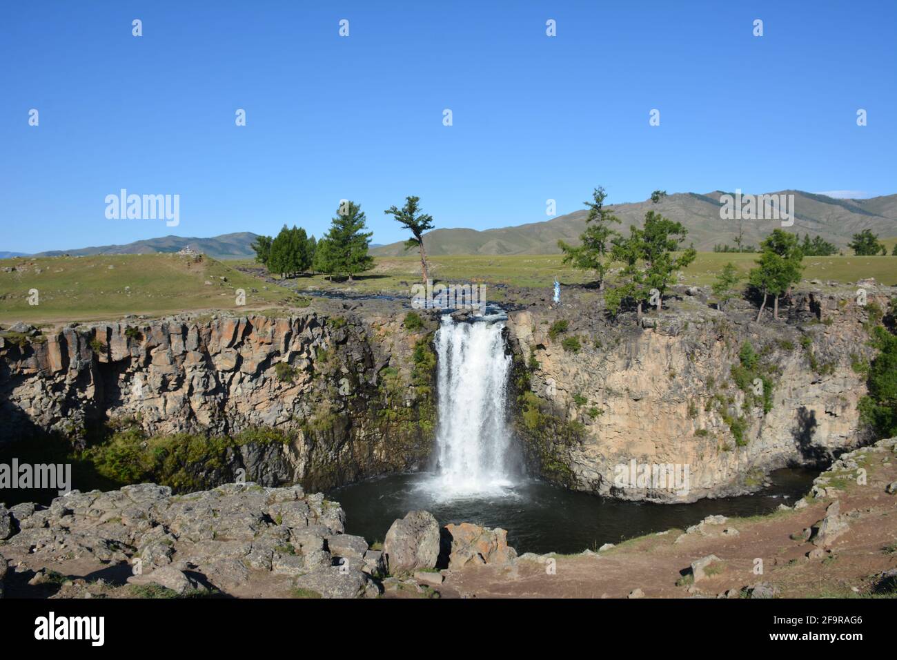 The Red Waterfall, also known as Ulaan Tsutgalan on the Orkhon River in ...