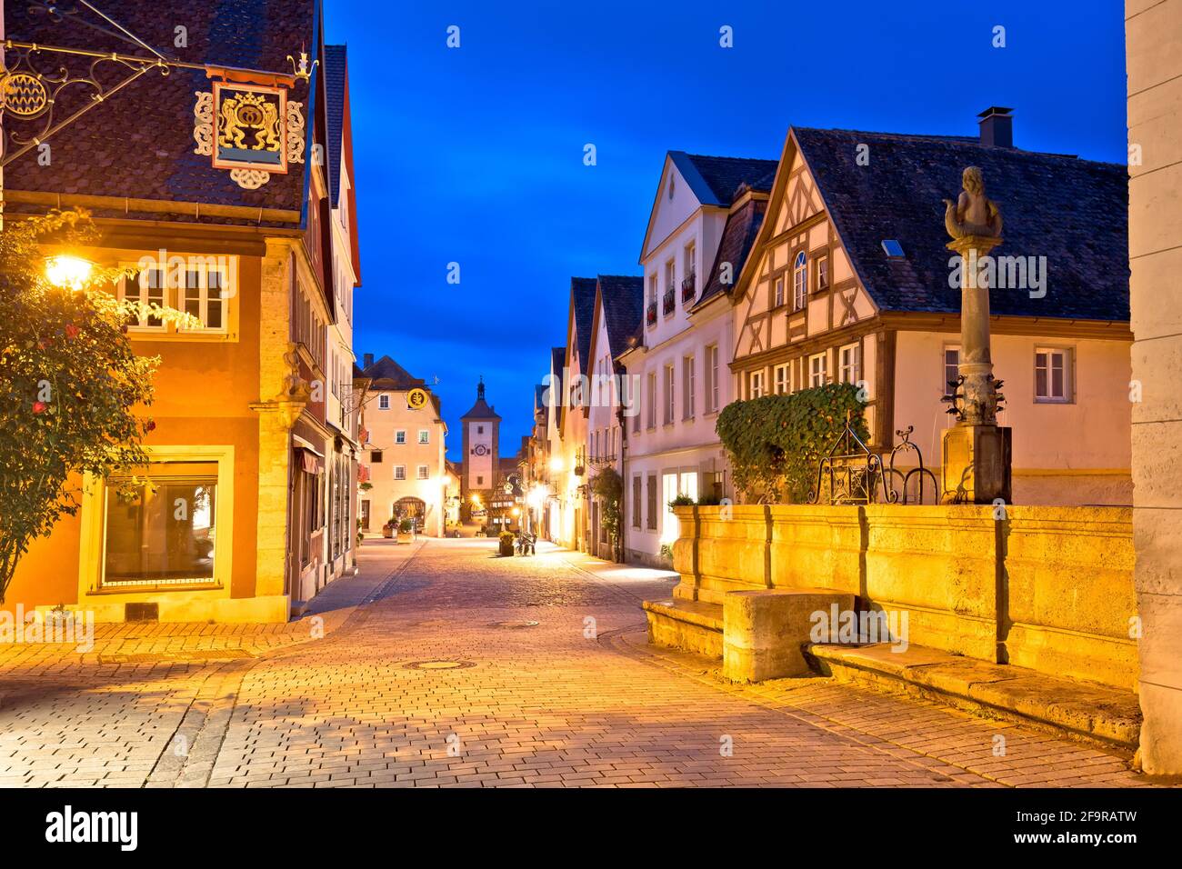 Rothenburg ob der Tauber. Hisoric tower gate and cobbled street of ...
