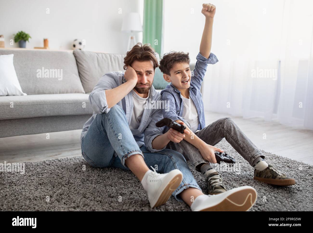 Boy celebrating video game hi-res stock photography and images - Alamy
