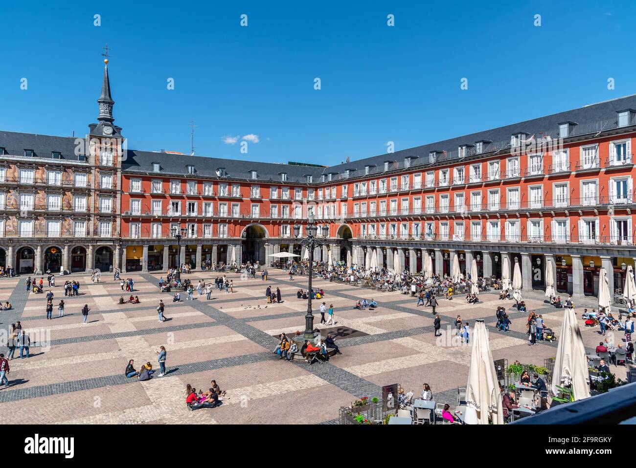 Madrid, Spain - April, 18 2021: People enjoying in restaurant terraces ...