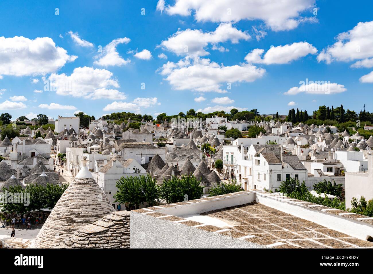 Conical rooftops of the typical Trulli huts in the old village of ...