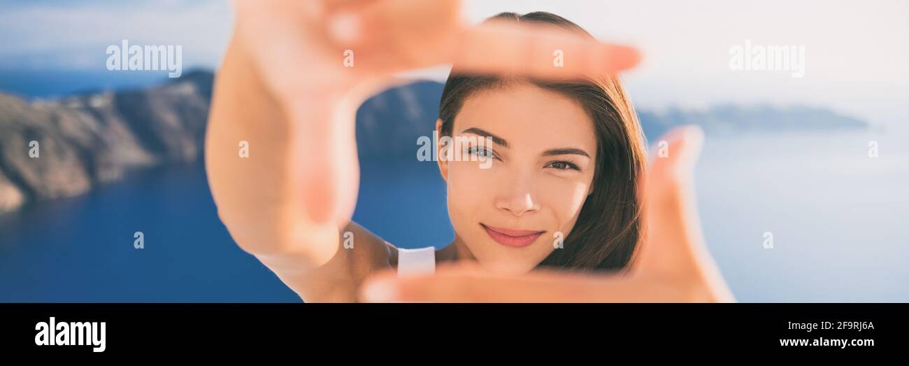 Beautiful young woman framing face with hands portrait banner panorama ...