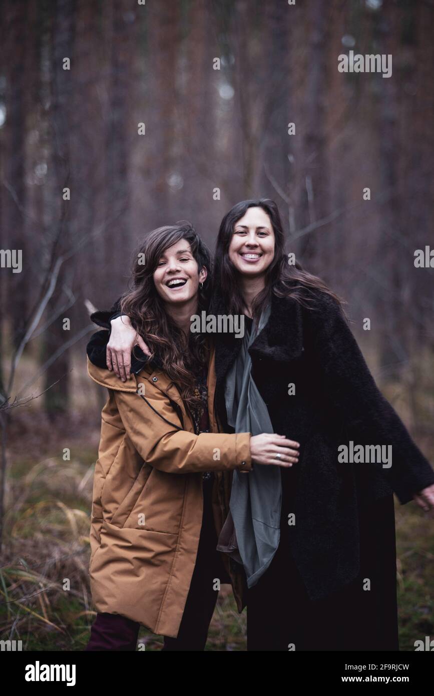 Female friends hug hi-res stock photography and images - Alamy