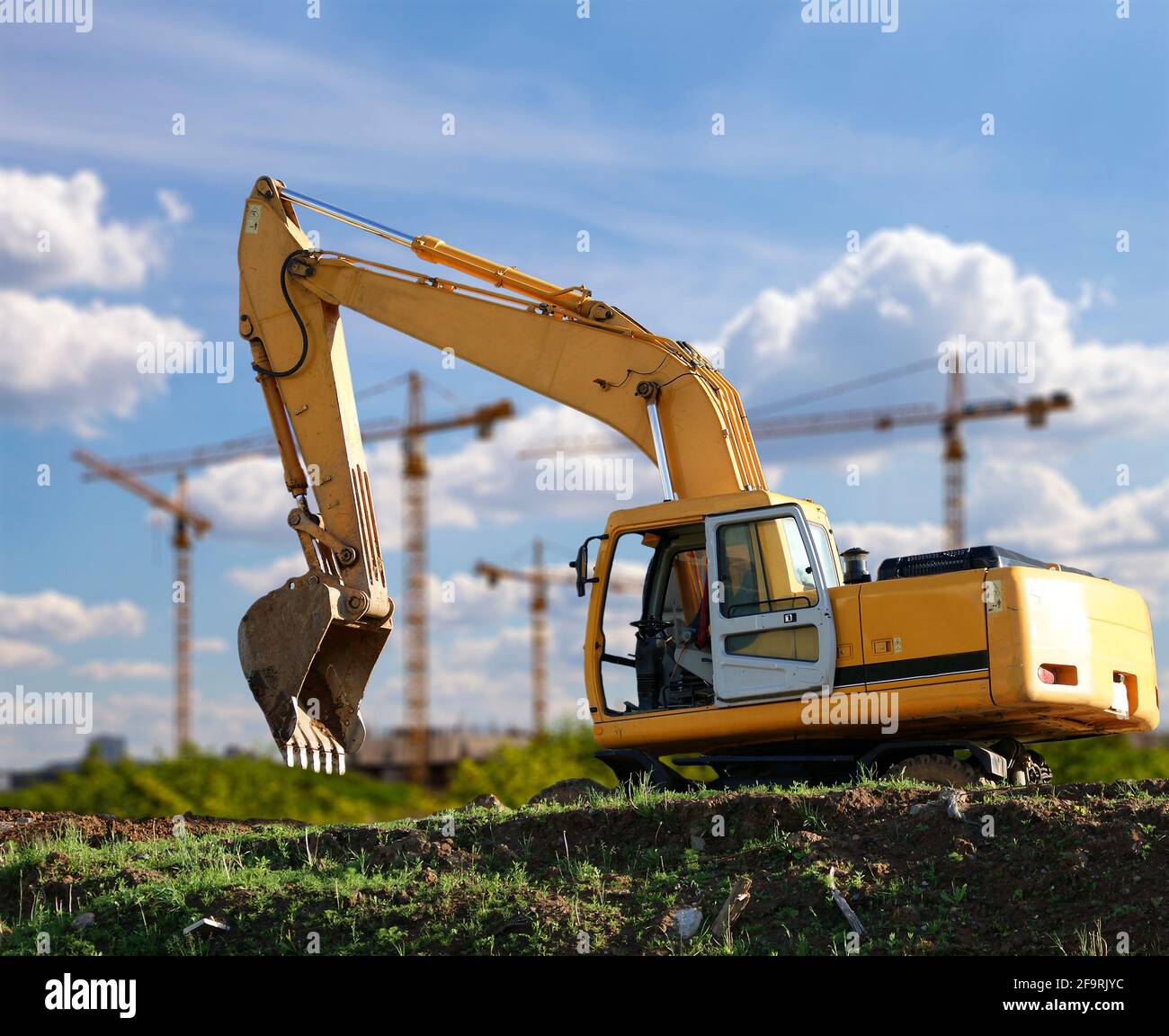 Construction machine (excavator) on the background construction site ...