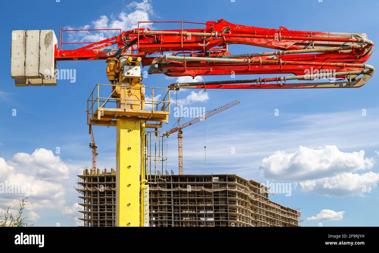 Construction concrete pump (pump truck) on the background construction ...