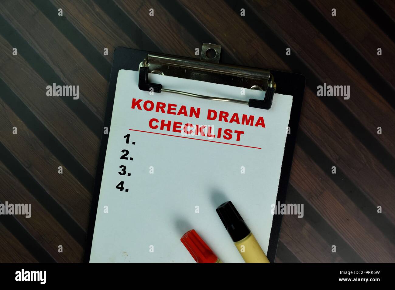 Korean Drama Checklist write on a paperwork and supported by additional ...