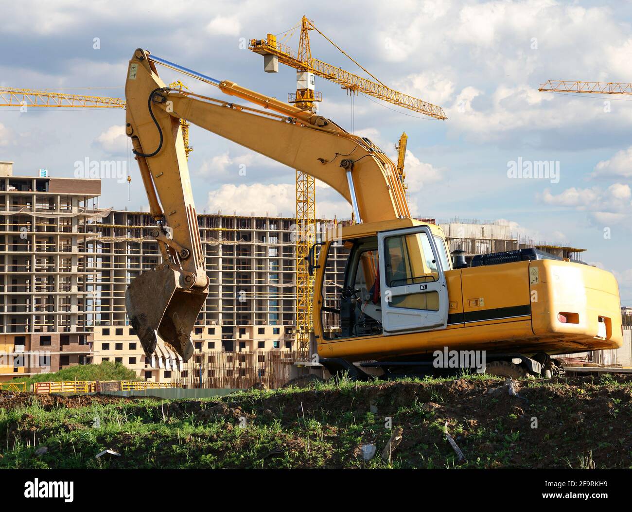 Construction machine (excavator) on the background construction site ...