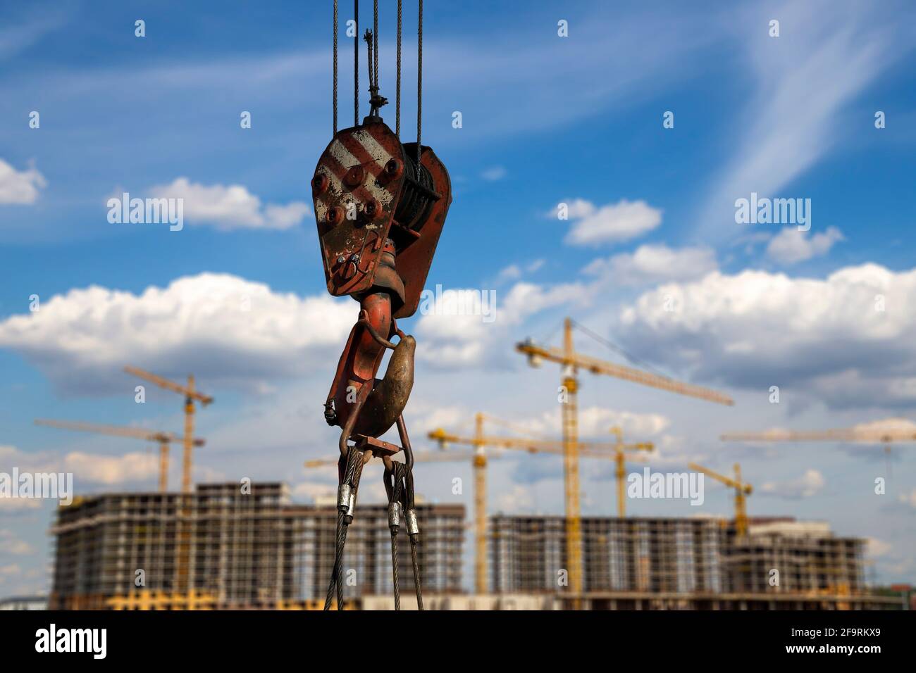 Part of a construction machine (excavator or crane) on the background ...