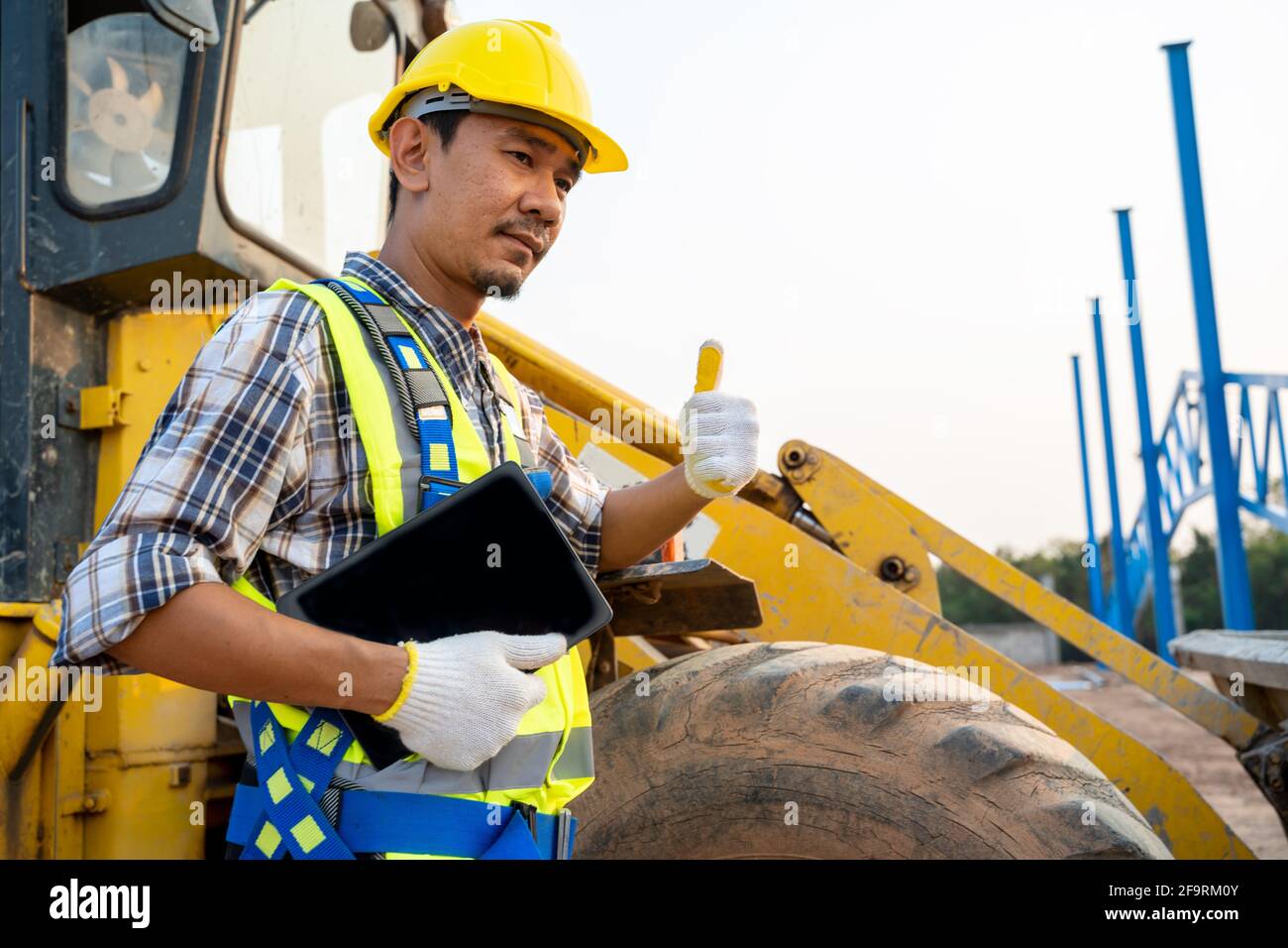 Man driving digger hi-res stock photography and images - Alamy