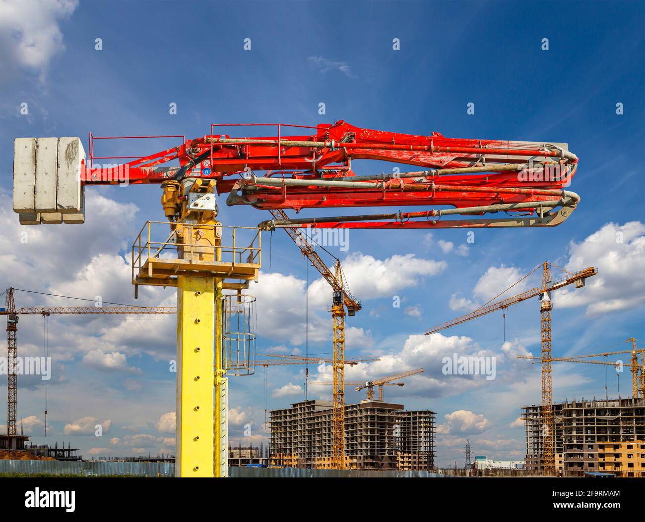 Construction concrete pump (pump truck) on the background construction ...