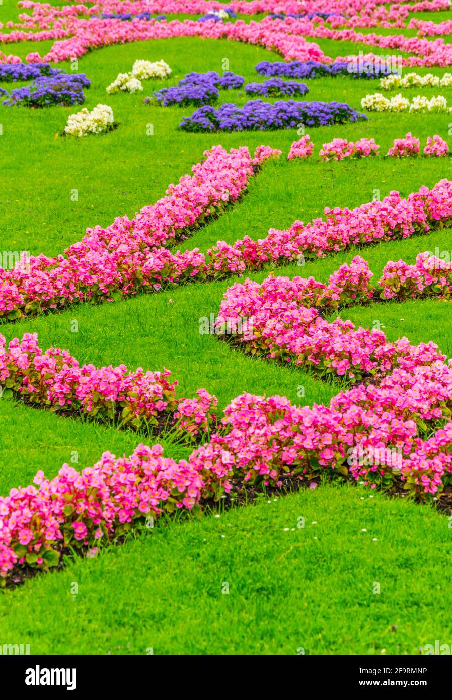 view of colorful flowers at the mirabell palace garden in Salzburg ...