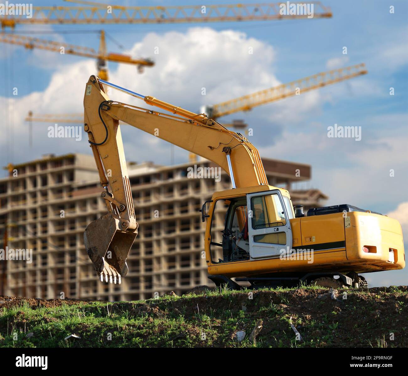 Construction machine (excavator) on the background construction site ...