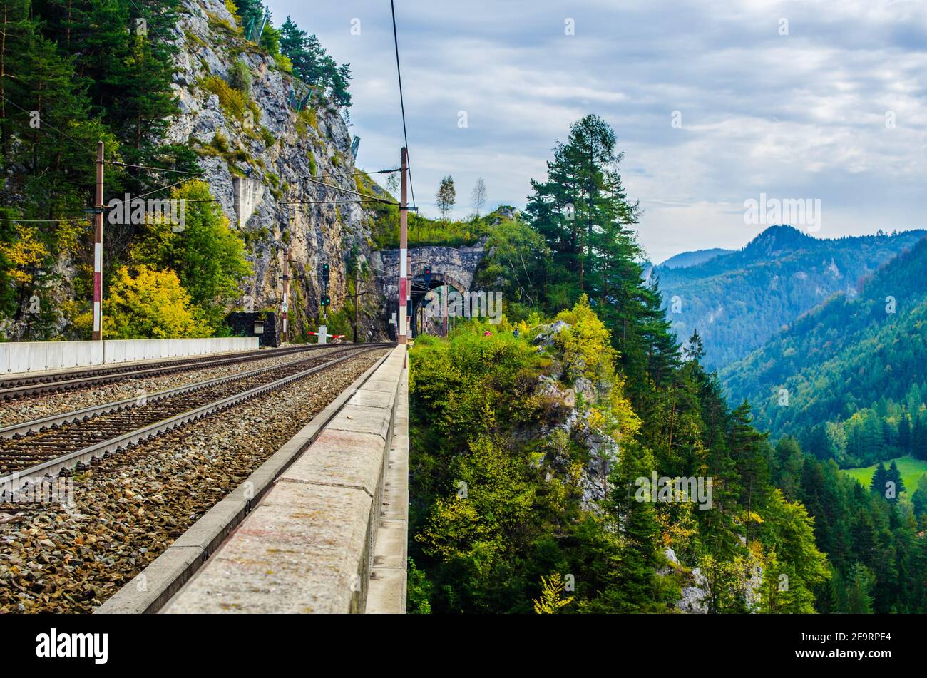view of a railroad bridge of the semmeringbahn railway in austria which ...