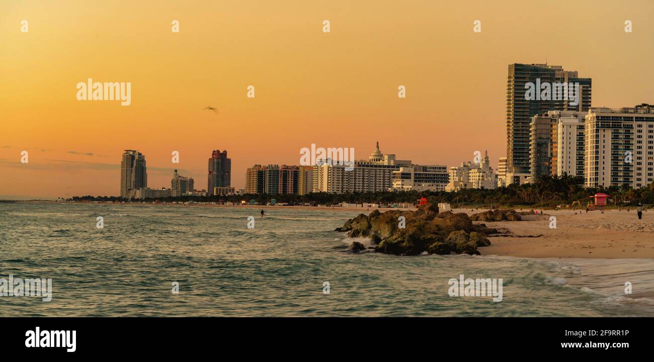 city skyline at sunset beach miami florida panorama horizon sky color ...