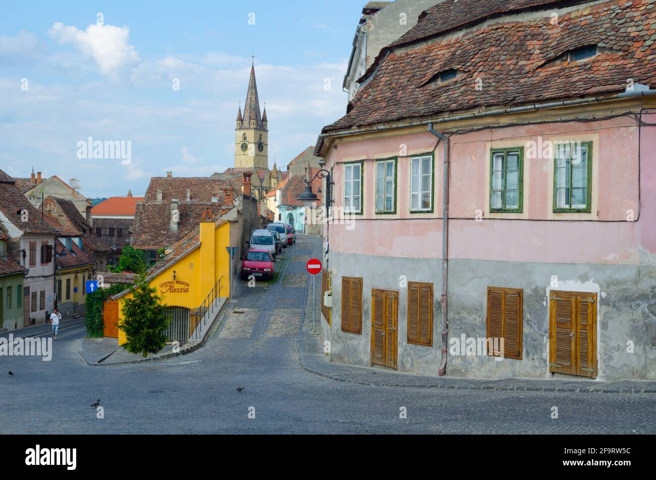 view of the old town of romanian city sibiu above which stands majestic ...