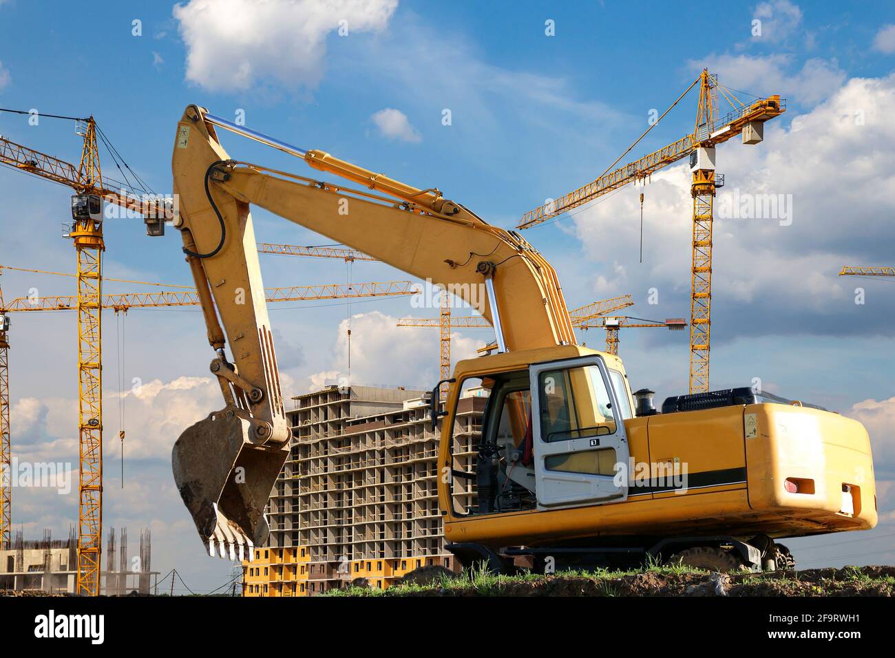 Construction machine (excavator) on the background construction site ...