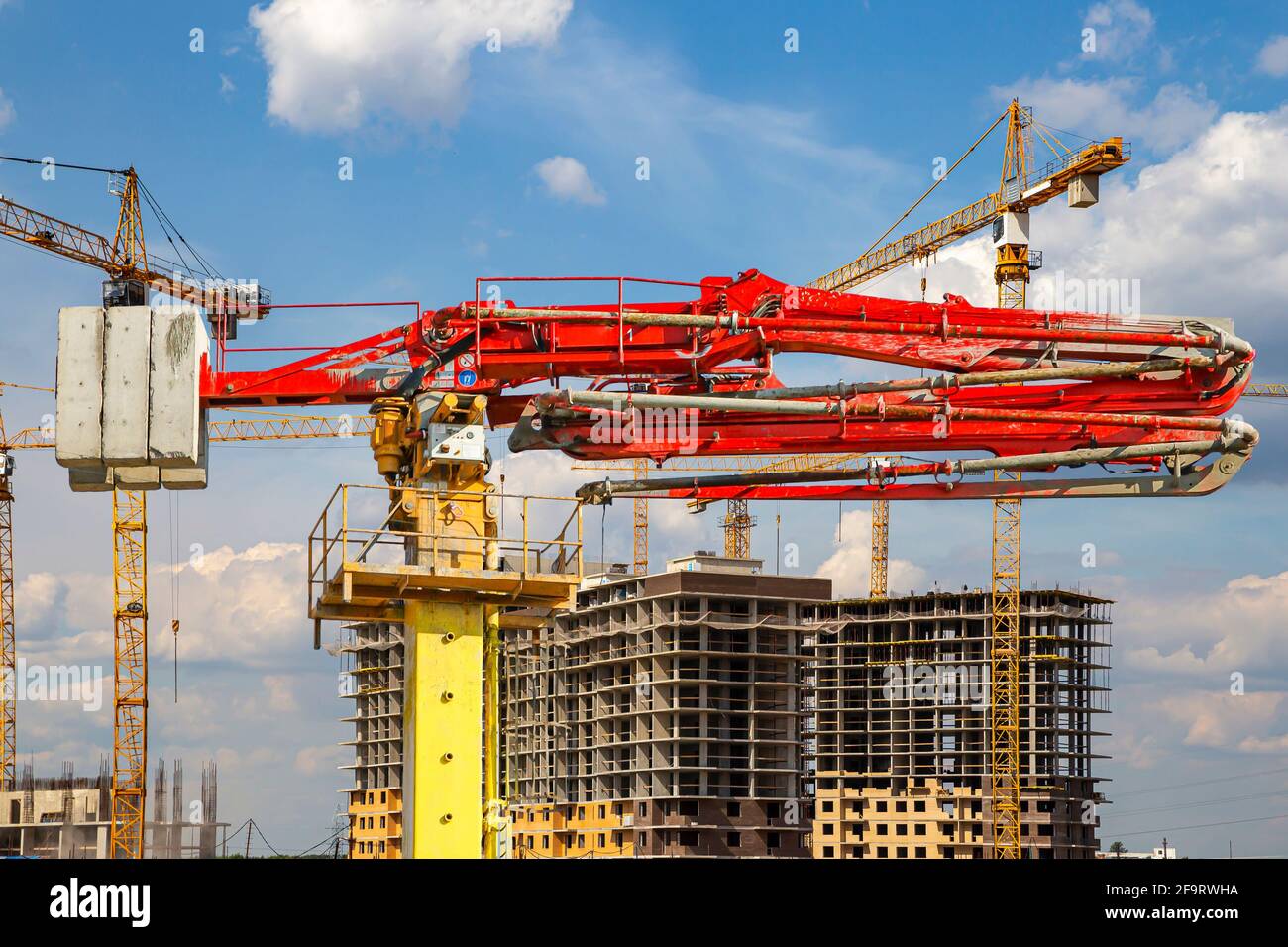 Construction concrete pump (pump truck) on the background construction ...