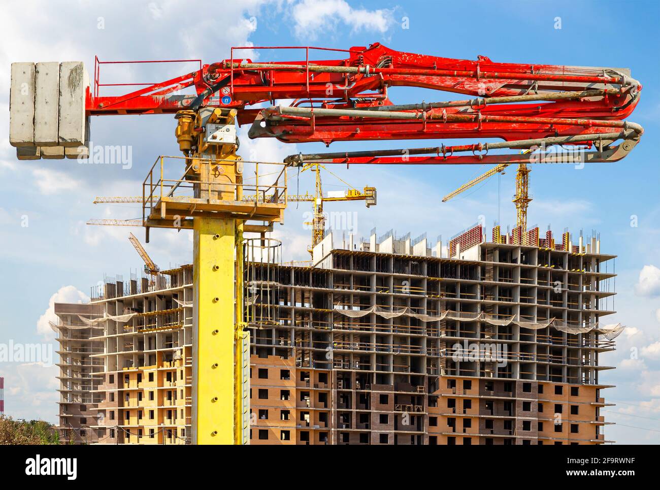Construction concrete pump (pump truck) on the background construction ...